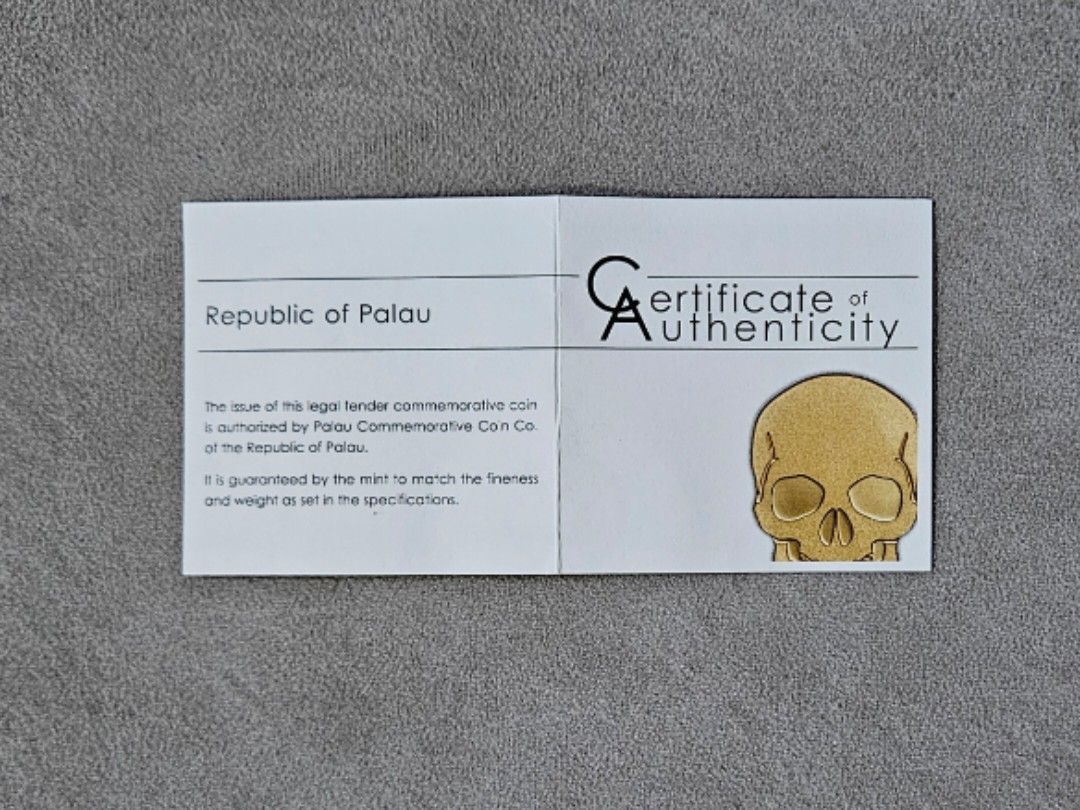 Palau 2016 $1 Skull In Gold coin with Certificate Of Authenticity ...
