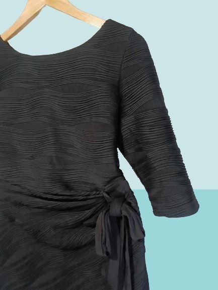 BLACK DRESS with horizontal ridges creating an elegant pattern., Women ...