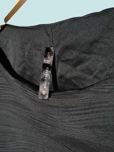 BLACK DRESS with horizontal ridges creating an elegant pattern., Women ...