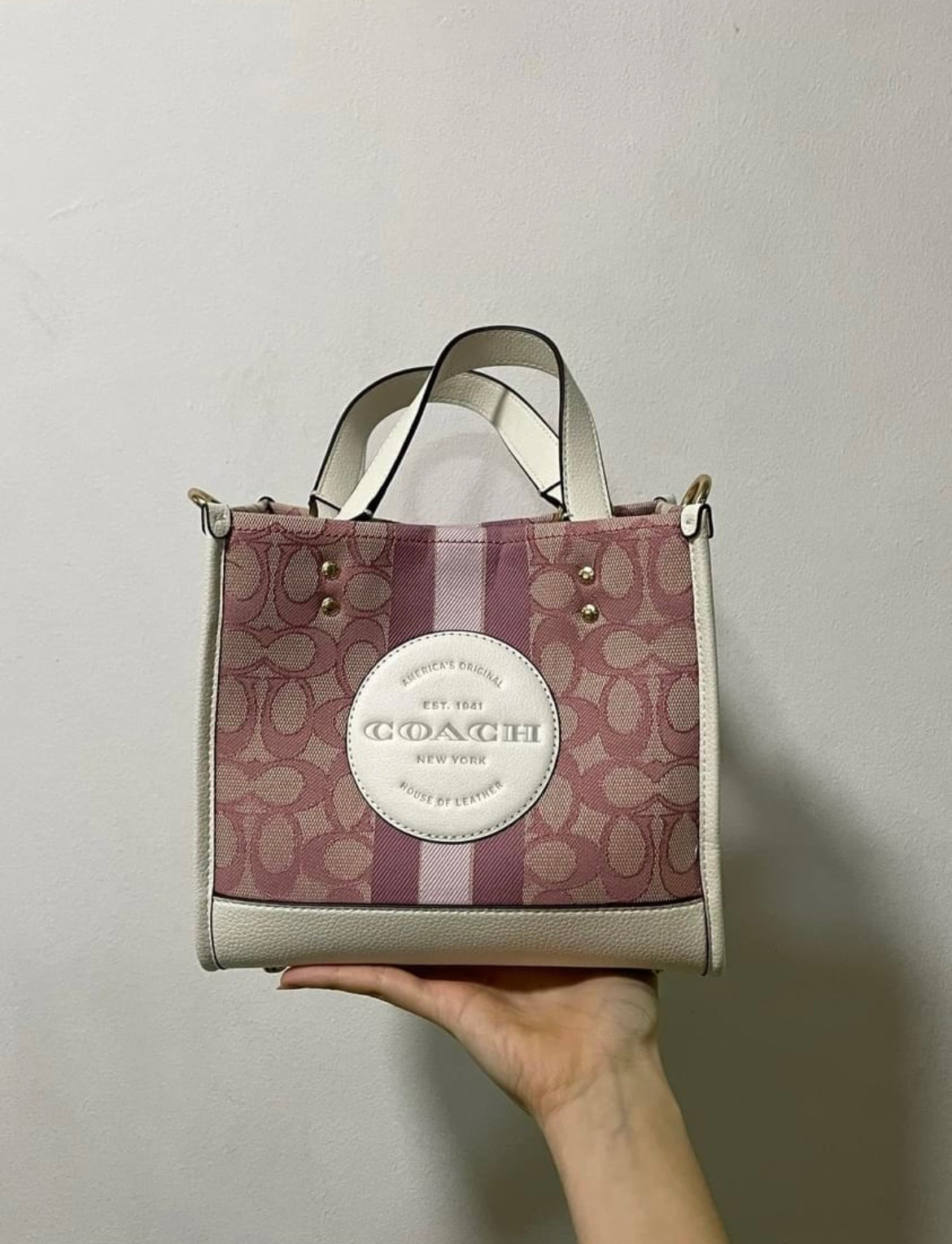 Coach Dempsey Totebag in pink, Luxury, Bags & Wallets on Carousell