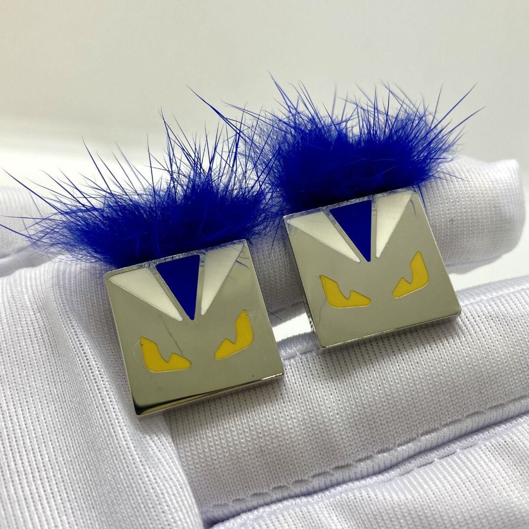 FENDI SILVER AND BLUE KARL LAGERFELD MONSTER FUR CUFF LINKS 237037998 ...