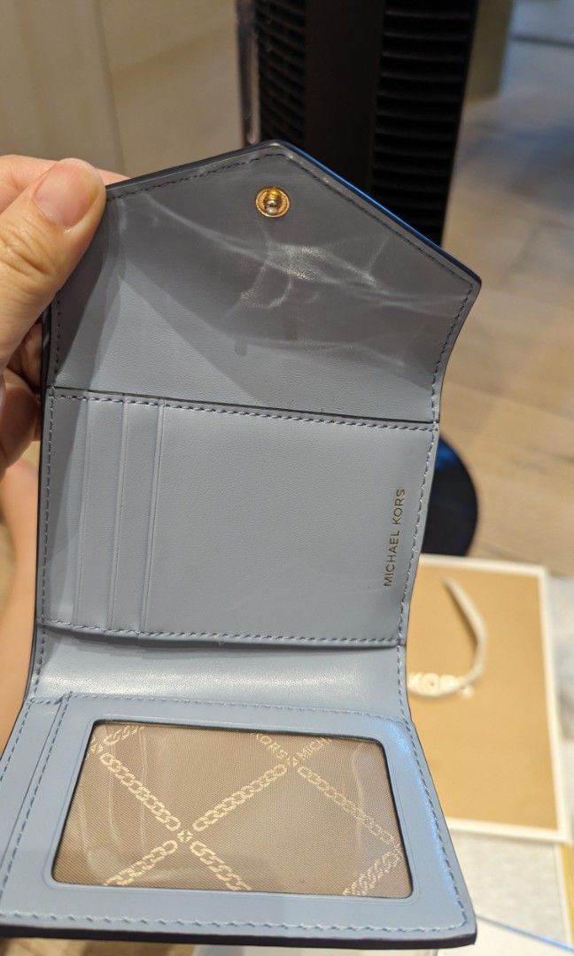 Michael Kors Light Blue Trifold Wallet, Luxury, Bags & Wallets on Carousell