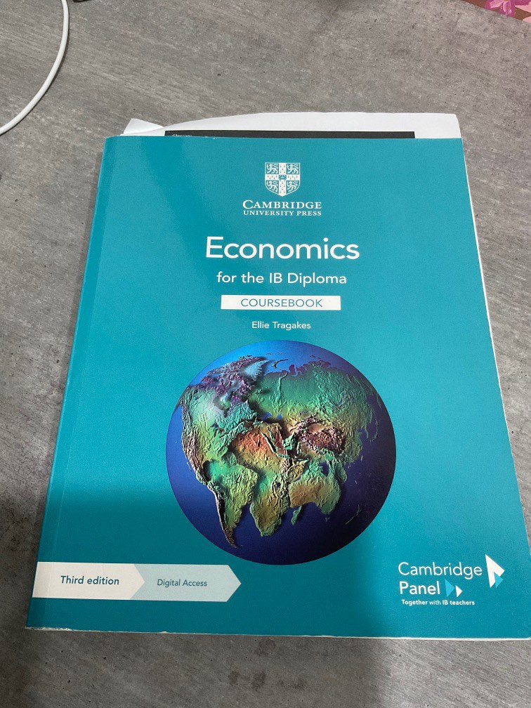 IB economics Cambridge textbook (With free glossary), Hobbies & Toys ...
