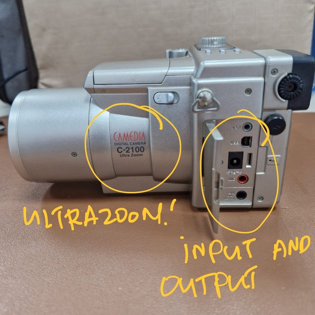 Olympus C2100UZ old school digicam, Photography, Cameras on Carousell