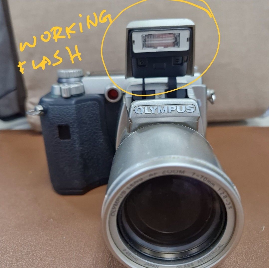 Olympus C2100UZ old school digicam, Photography, Cameras on Carousell