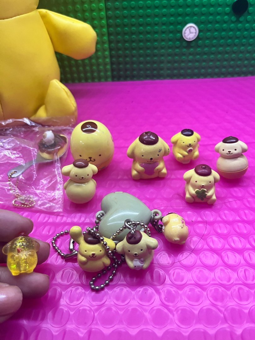 Sanrio pompompurin charm bundle, Hobbies & Toys, Toys & Games on Carousell