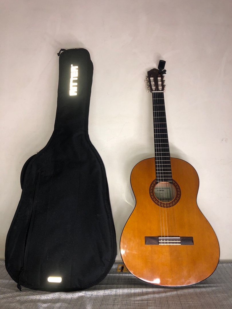Yamaha guitar + tuner + carrying bag+batter for tuner + 35 pc different ...
