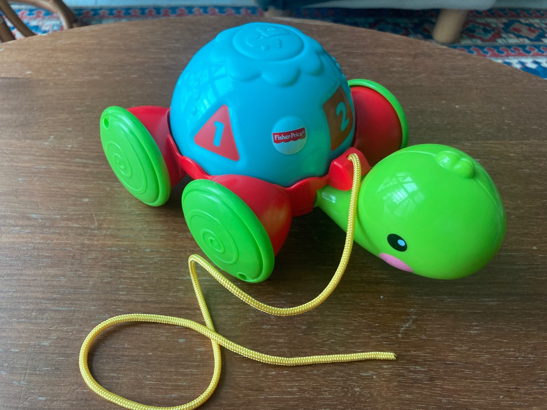 Fisher price pull turtle like new, Babies & Kids, Infant Playtime on ...
