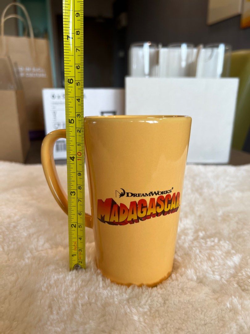 Madagascar Universal studio singapore mug, Furniture & Home Living ...