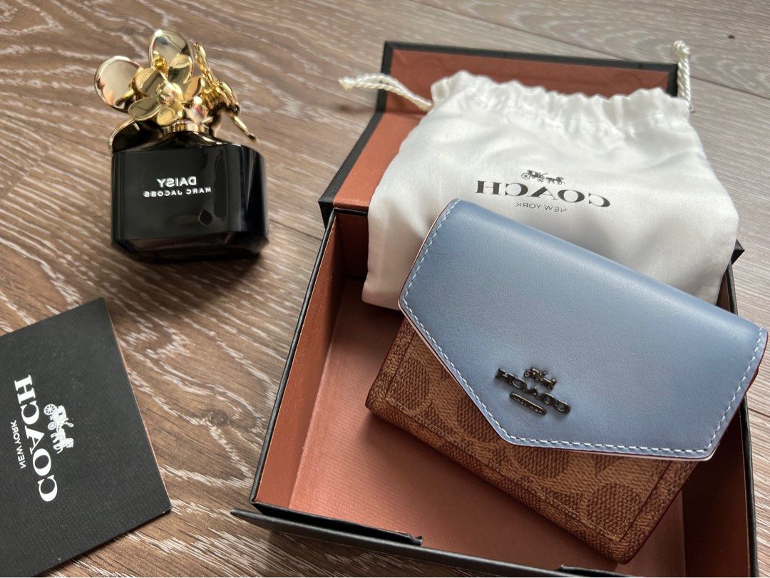 Coach blue compact wallet, Luxury, Bags & Wallets on Carousell