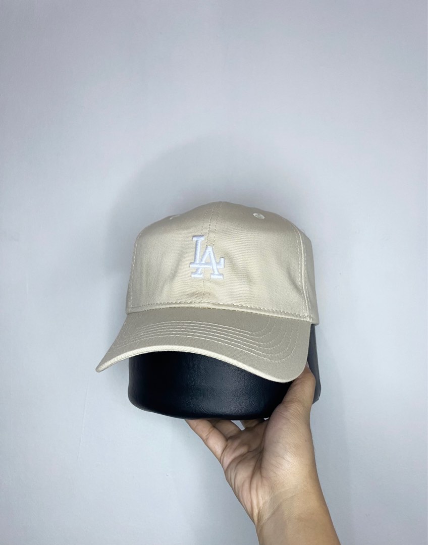 LA mlb cream, Men's Fashion, Watches & Accessories, Caps & Hats on Carousell