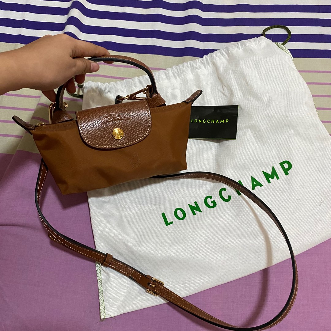 Longchamp mini le pliage with sling, Luxury, Bags & Wallets on Carousell