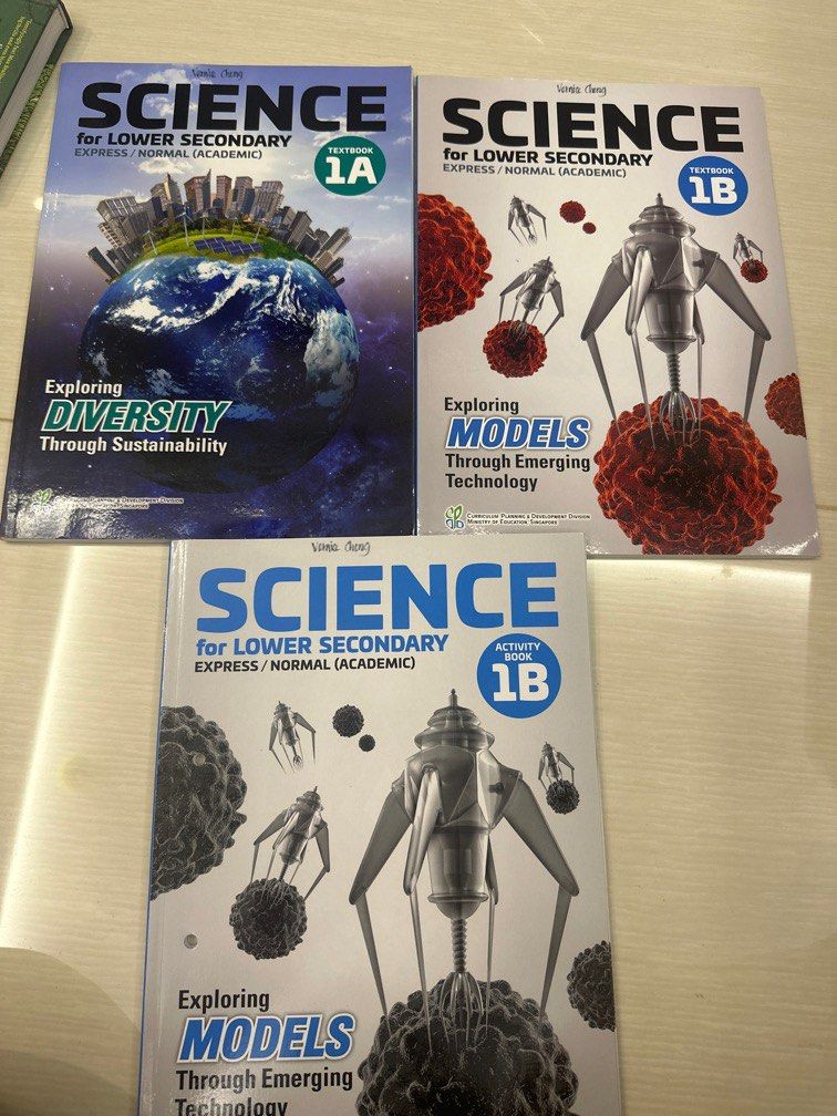 Sec 1 science textbooks activity book, Hobbies & Toys, Books ...