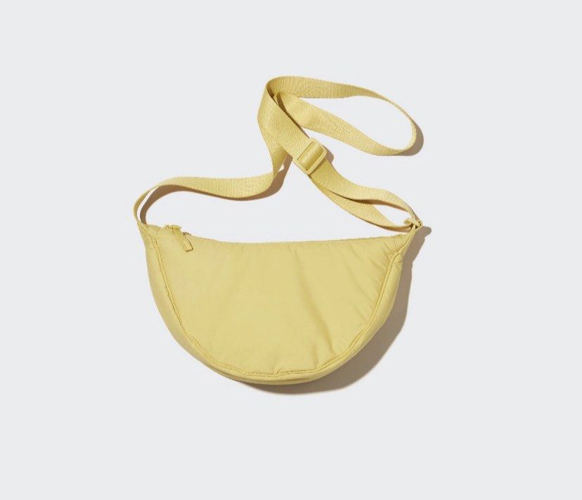 Original Uniqlo Dumpling round bag unisex, Men's Fashion, Bags, Sling ...