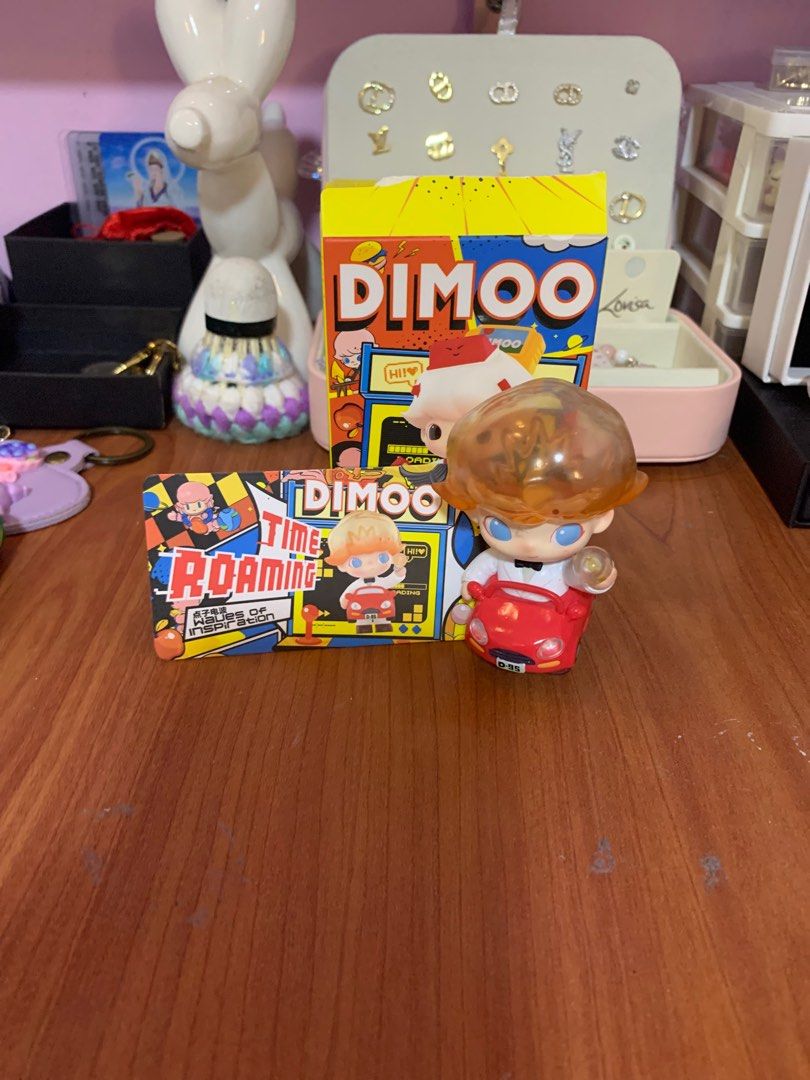 popmart dimoo time roaming comes with box and card with the figure ...