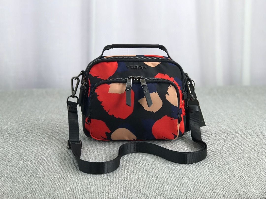 TUMI Claudia Nylon Crossbody, Women's Fashion, Bags & Wallets, Cross ...