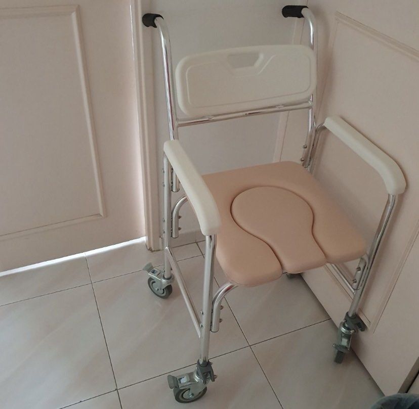 Commode chair with wheels and foot rest, Health & Nutrition, Assistive ...