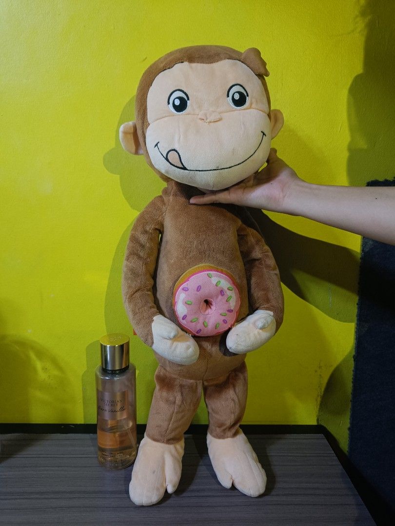 Curious George w/ donut, Hobbies & Toys, Toys & Games on Carousell