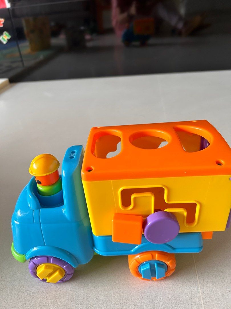 Shape sorting truck toy car, Babies & Kids, Infant Playtime on Carousell