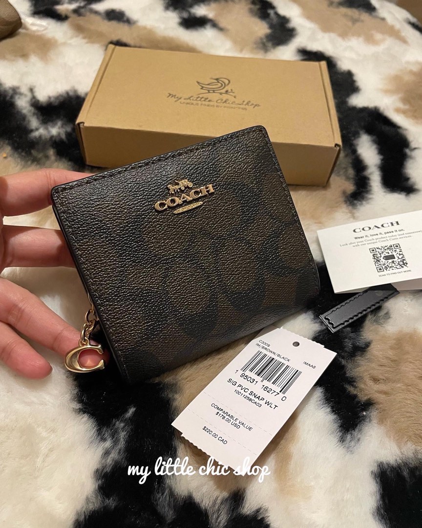 coach snap wallet in signature canvas mahogany, Women's Fashion, Bags ...