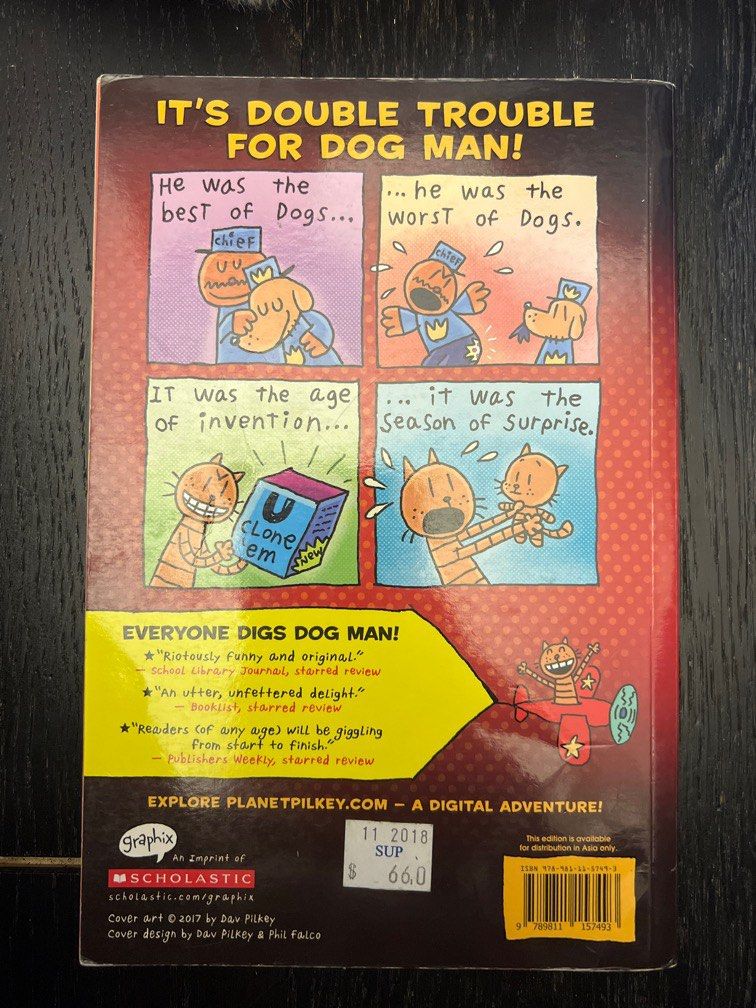Dog man a tale of two kitties, 興趣及遊戲, 書本 & 文具, 兒童書籍 - Carousell