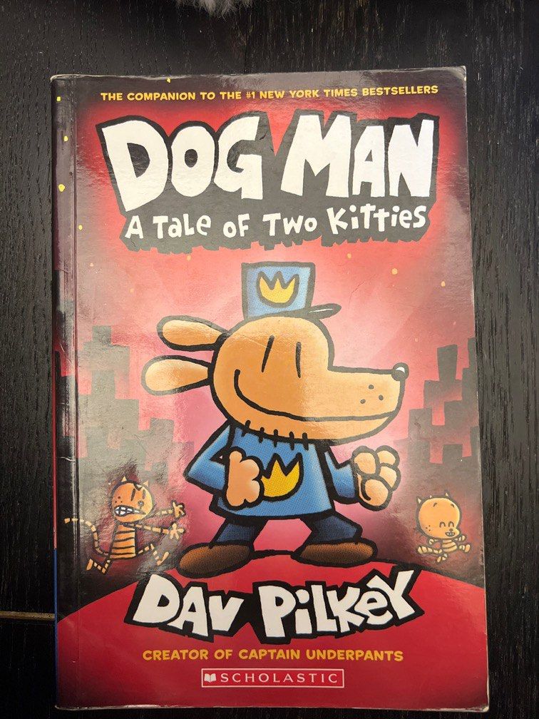 Dog man a tale of two kitties, 興趣及遊戲, 書本 & 文具, 小朋友書 - Carousell
