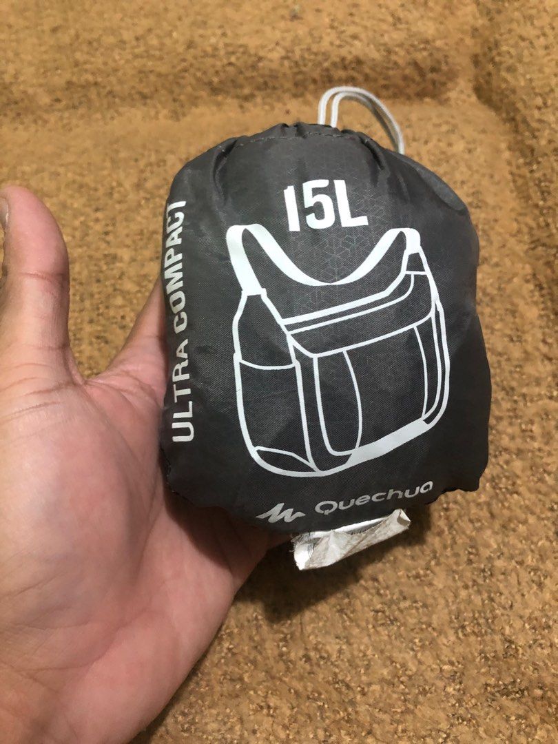 Quechua ultra compact emergency waterproof shoulder bag on Carousell