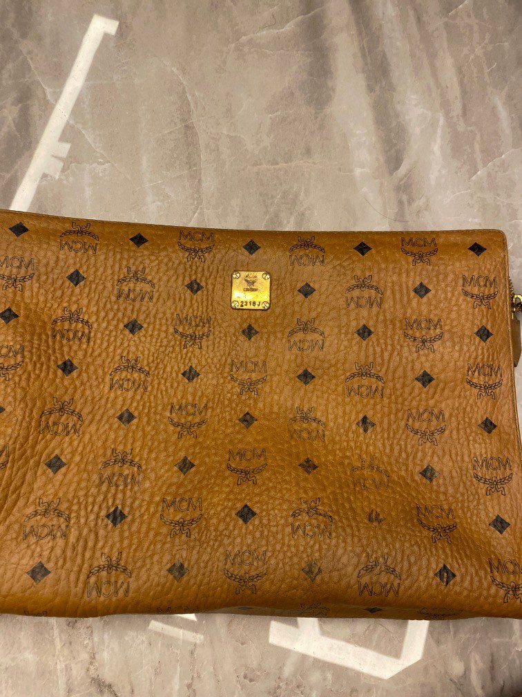 MCM Clutch, Women's Fashion, Bags & Wallets, Clutches on Carousell