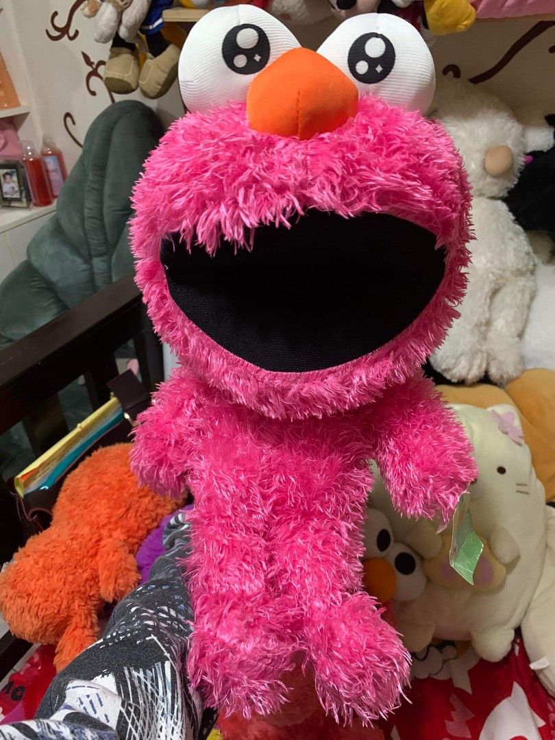 Sesame street pink elmo on Carousell
