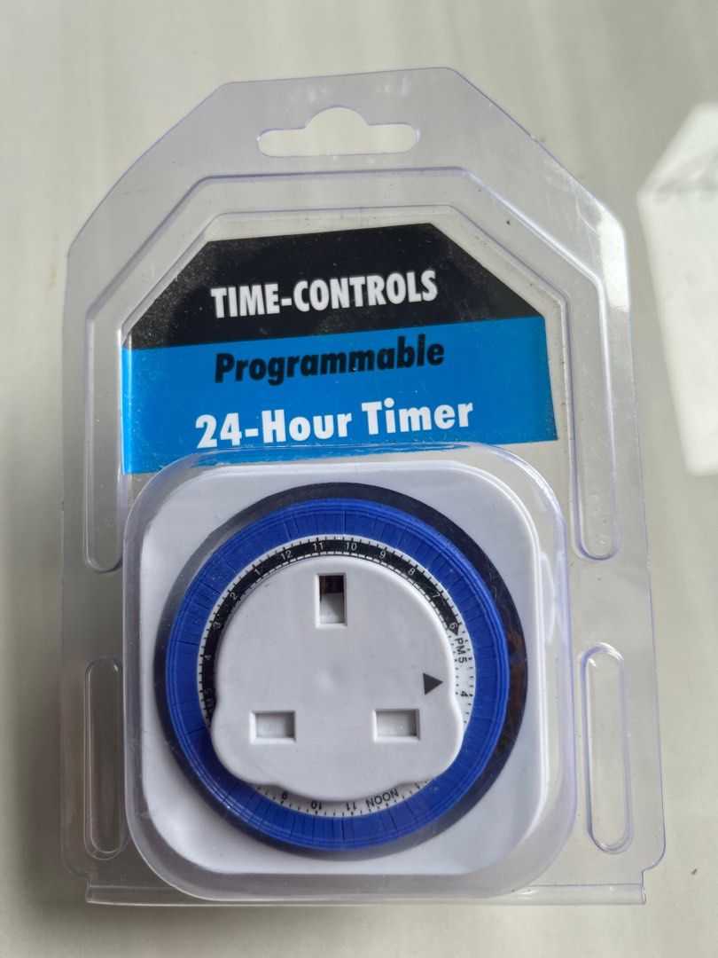 Timer Socket Tv And Home Appliances Electrical Adaptors And Sockets On