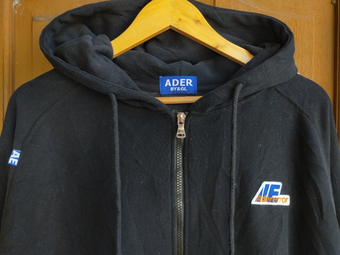Ader Error logo zip up hoodie black, Men's Fashion, Tops & Sets ...