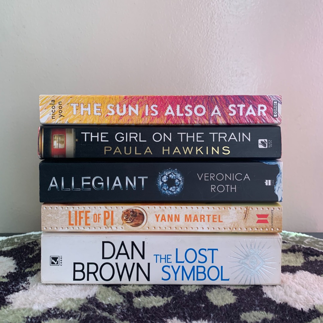 Books (Dan Brown, Nicola Yoon, Veronica Roth, Yann Martel, Paula ...