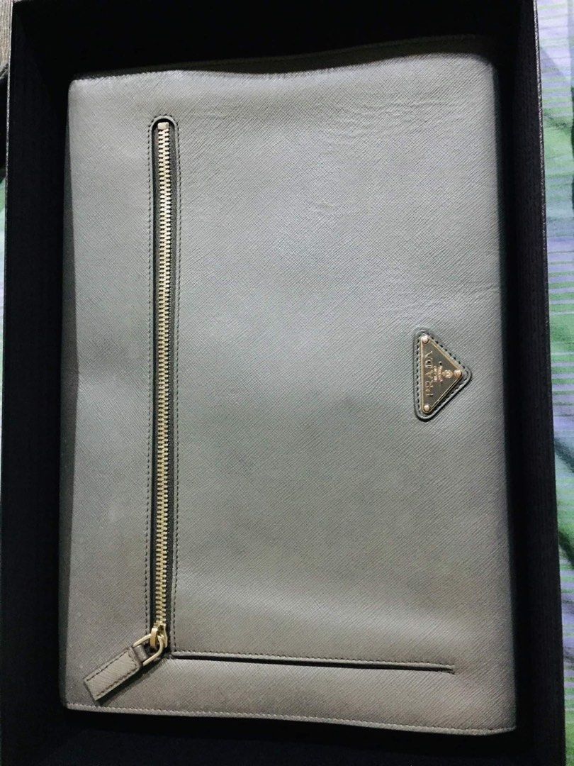 Prada Push Lock Portfolio, Luxury, Bags & Wallets on Carousell