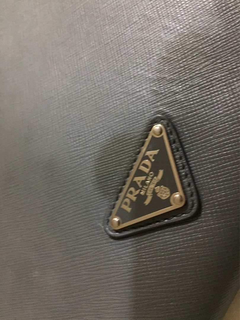 Prada Push Lock Portfolio, Luxury, Bags & Wallets on Carousell