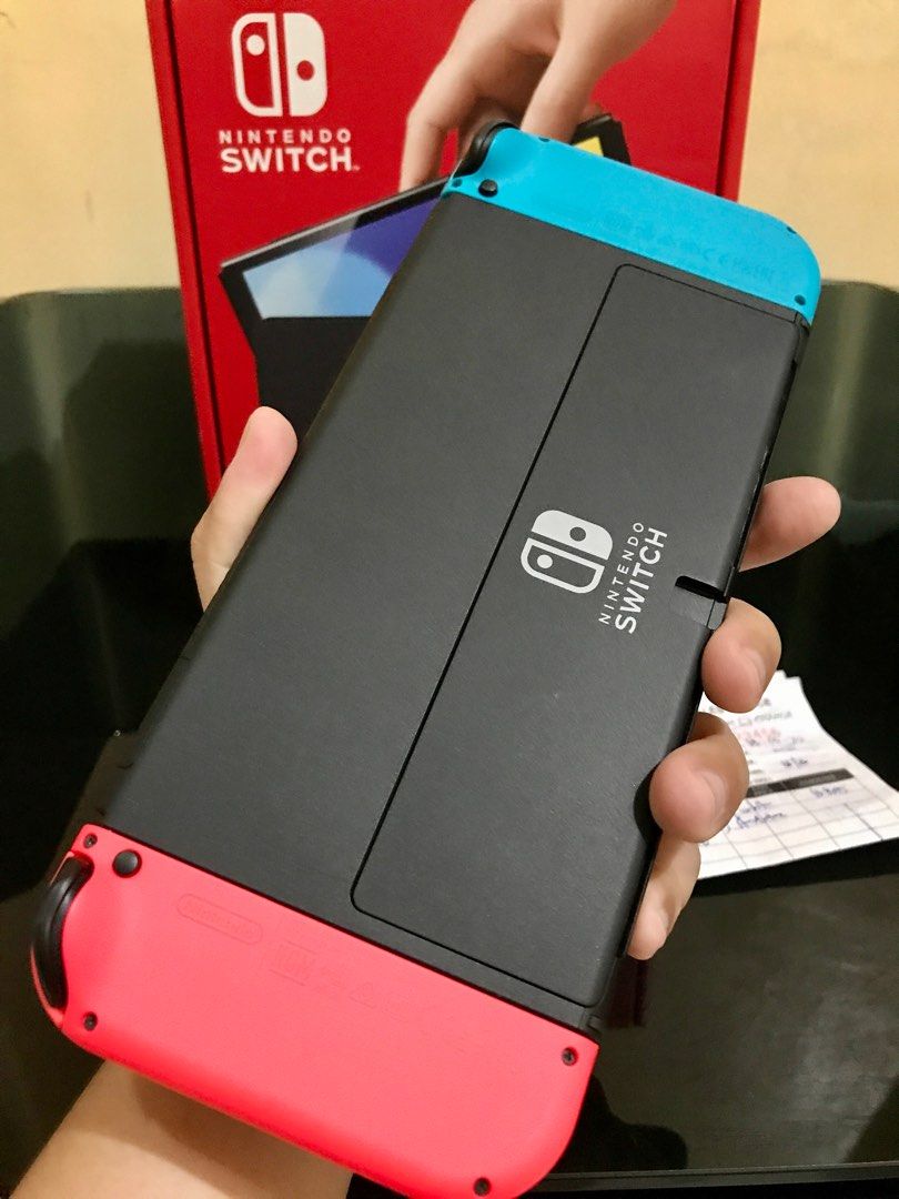 Nintendo Switch Oled with games, Video Gaming, Video Game Consoles, Nintendo on Carousell