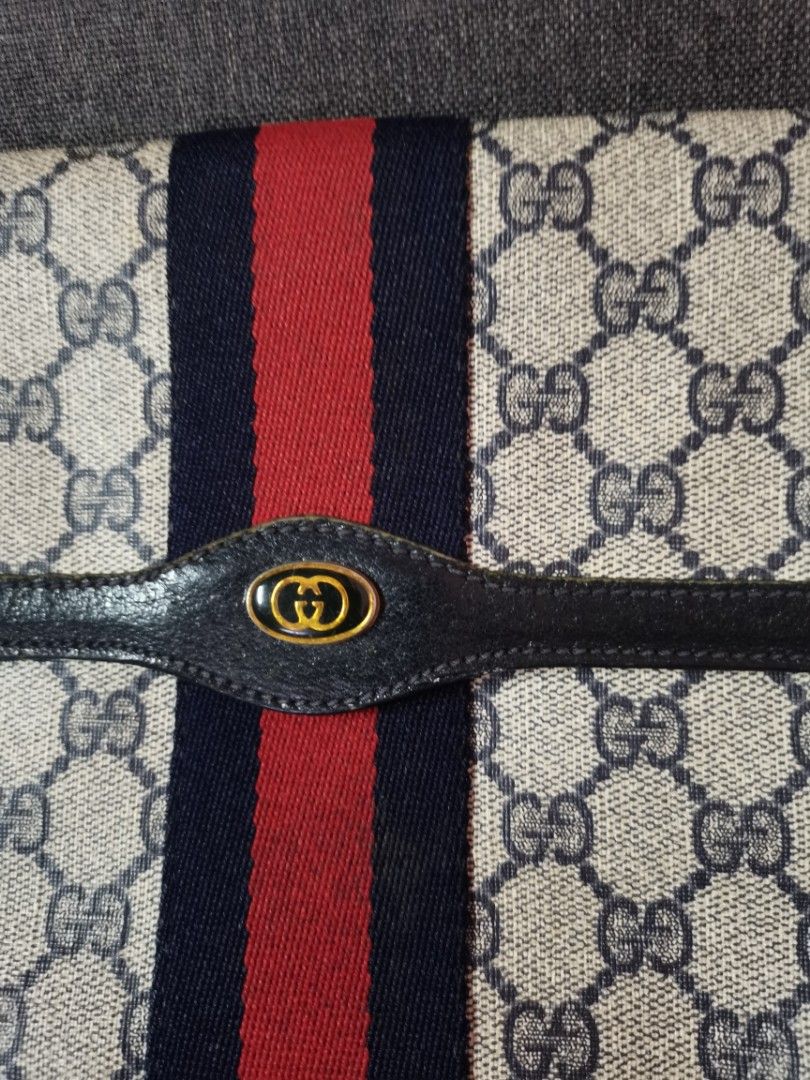 Vintage gucci cherry line clutch bag on Carousell