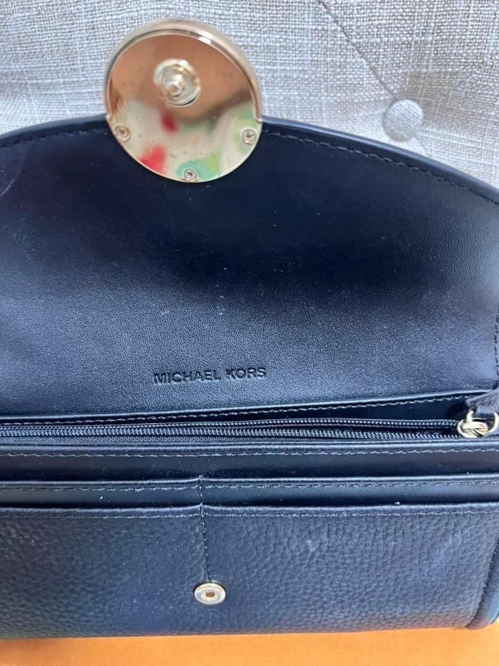 Authentic MK long wallet on Carousell