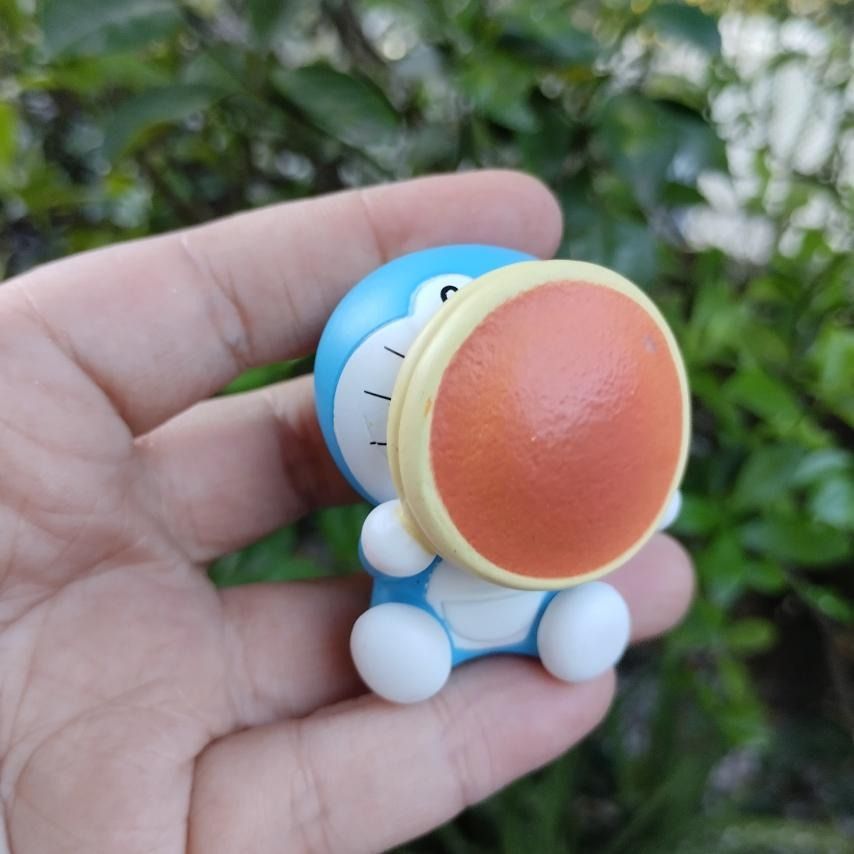 Doraemon eating Dorayaki mini Figure on Carousell