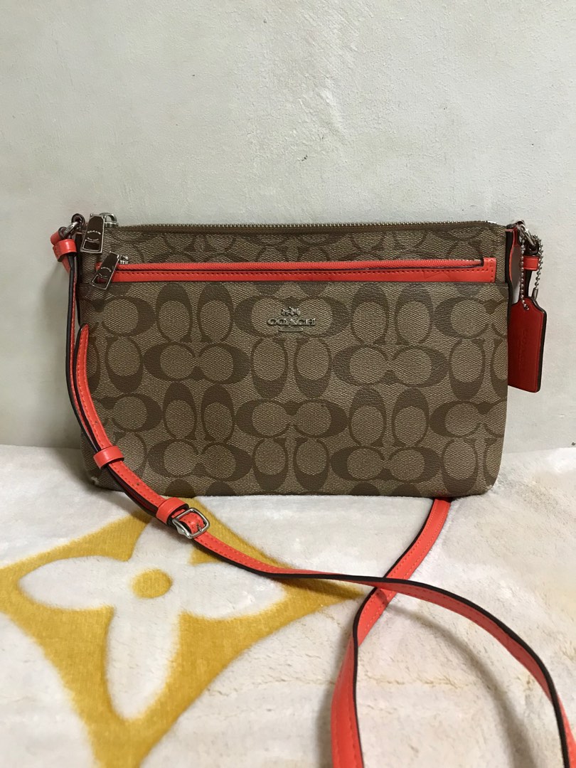 Authentic coach pvc sling bag on Carousell
