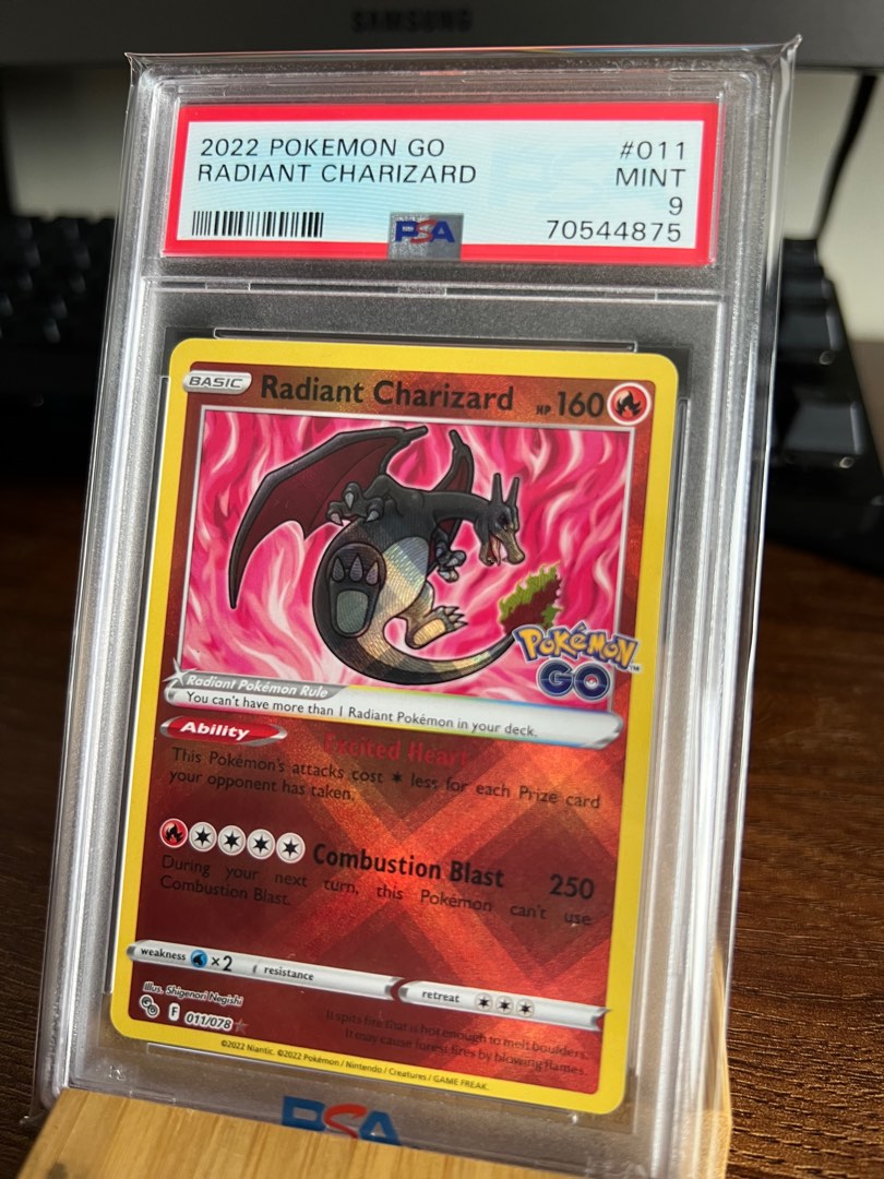 PSA9 Radiant Charizard, Hobbies & Toys, Toys & Games on Carousell