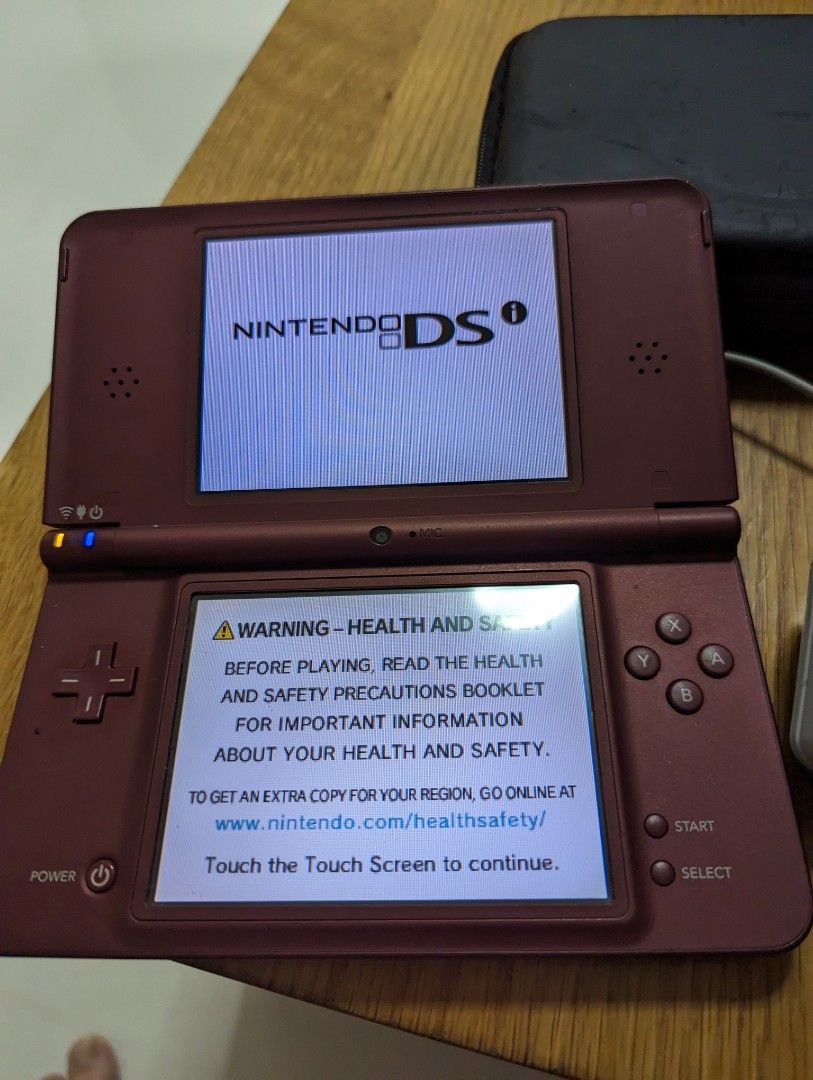 DSi xl burgundy with 5 games console with Lego star wars Mario sonic Olympic Ben 10 Moshi theme ...