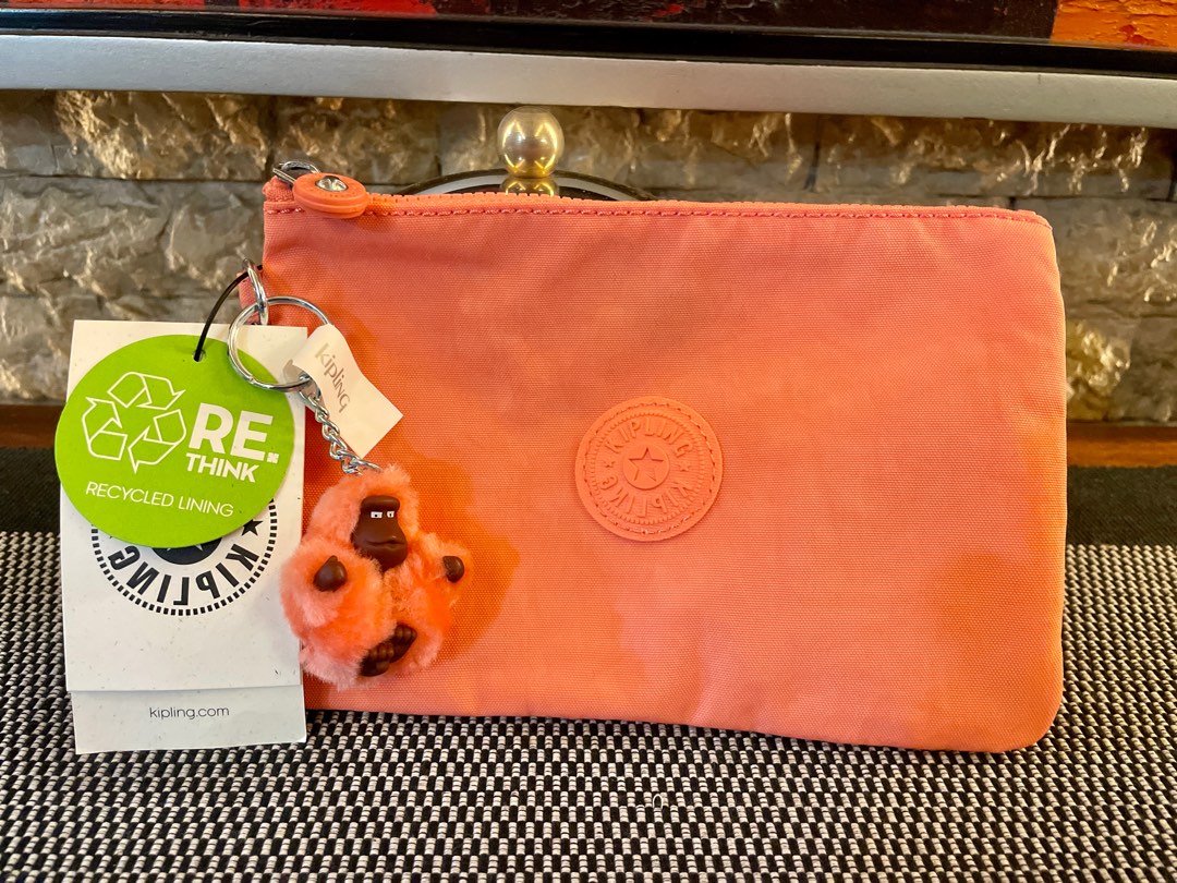 Kipling Small pouch Orange on Carousell