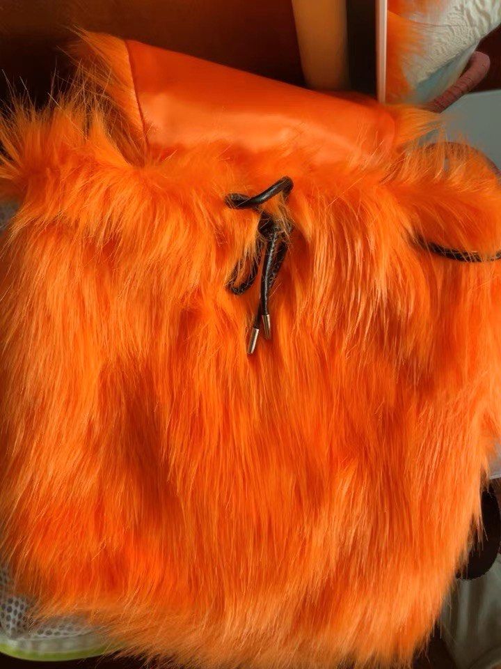 Orange furry Backpack, Women's Fashion, Bags & Wallets, Backpacks on ...