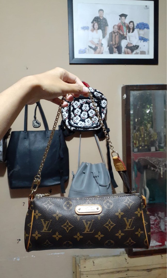LV Clutch Eva ada nomer seri, Barang Mewah, Tas & Dompet di Carousell