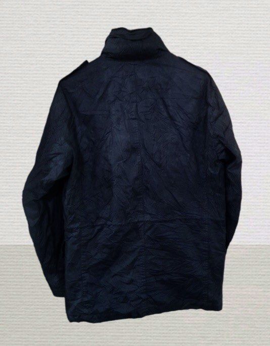 Uniqlo full zip water resist [wind breaker] parka Packable hoodie ...