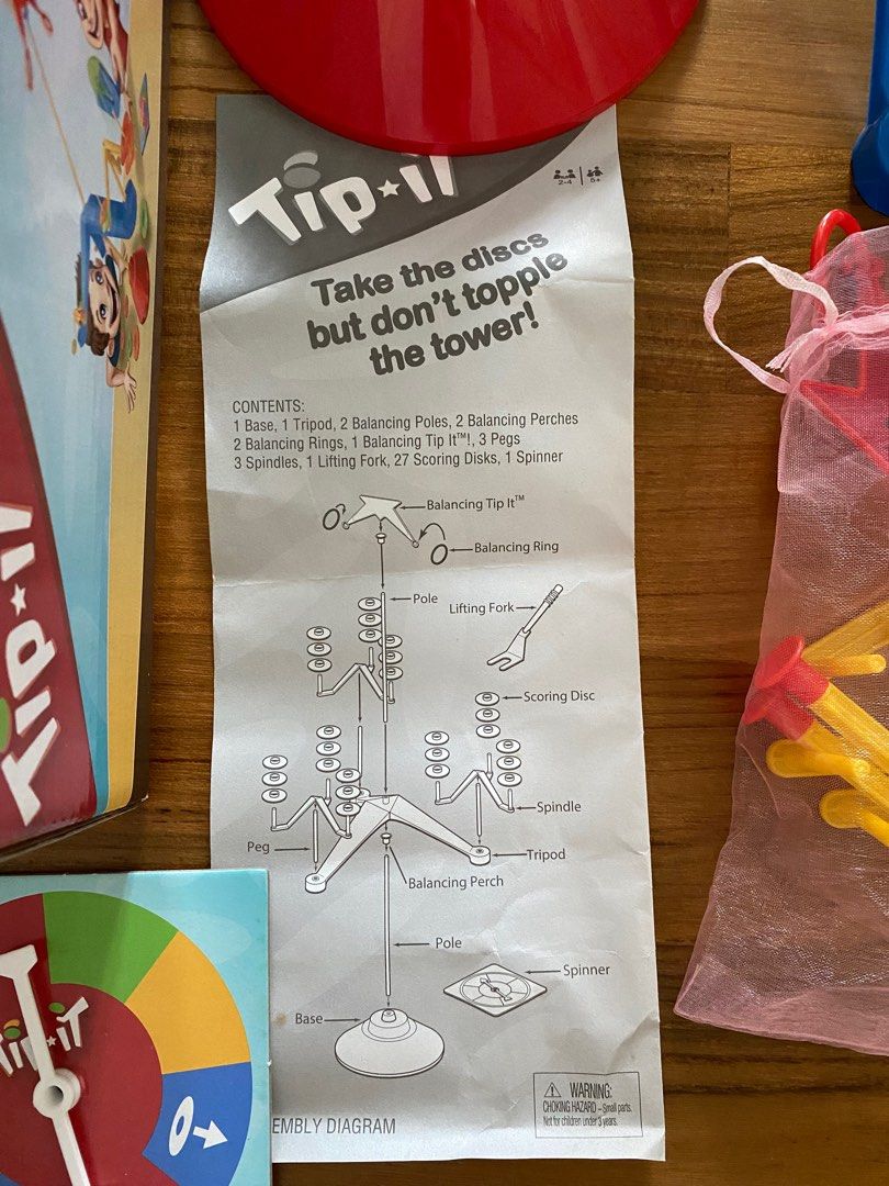 $9 Tip It game for children, Hobbies & Toys, Toys & Games on Carousell