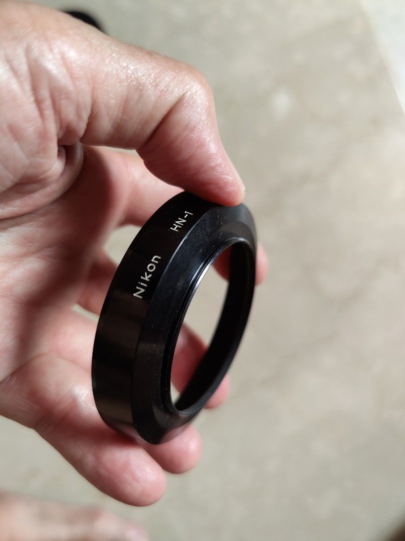 Nikon original lens hood HN-1, Photography, Lens & Kits on Carousell
