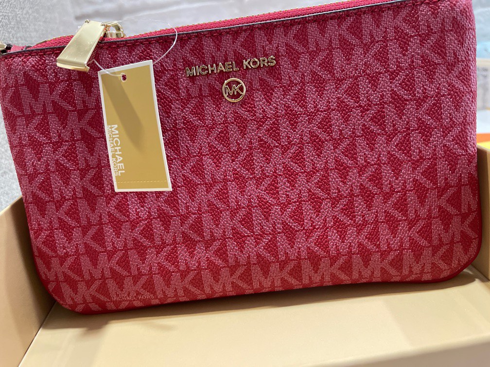 Michael Kors Pouch, Luxury, Bags & Wallets on Carousell