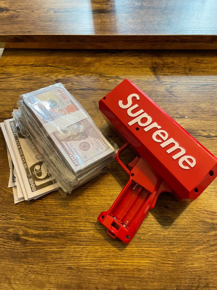 Prop supreme gun with prop money - no batter cover, Hobbies & Toys ...