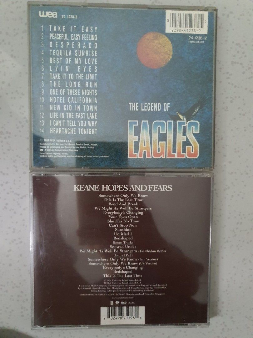 CDS- Goo goo Dolls. Jody Watley. Crowded House. Simply Red. Eagles. Keane. U2. Bonnie Raitt ...